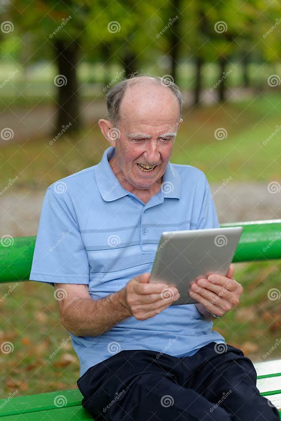 Friendly Handsome Old Man with Tablet Pc Stock Photo - Image of ...