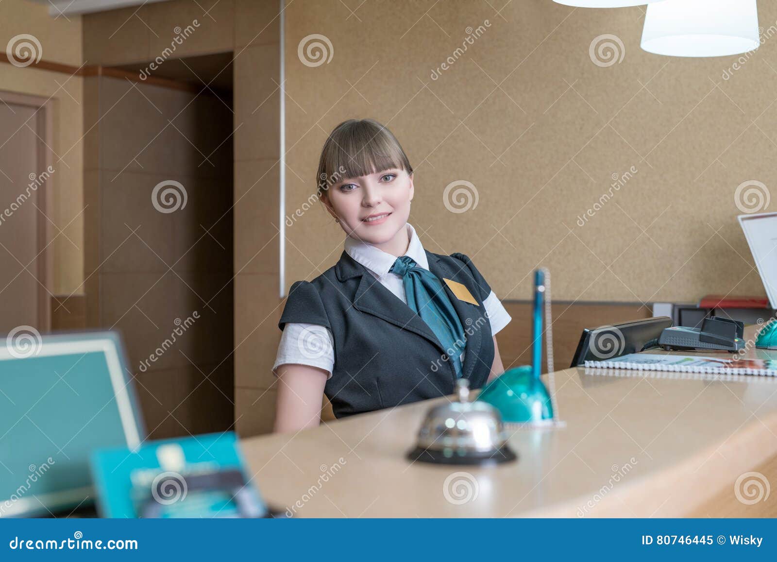 Friendly Hotel Worker Posing Behind Reception Stock Image - Image of ...