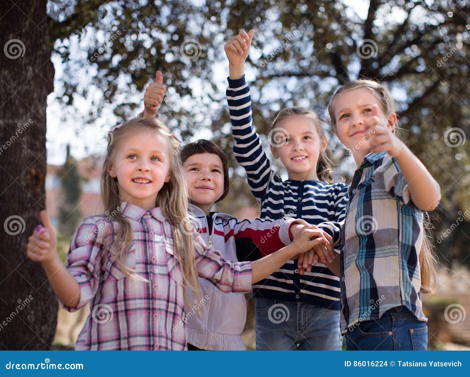 Friendly kids at the park stock photo. Image of child - 86016224