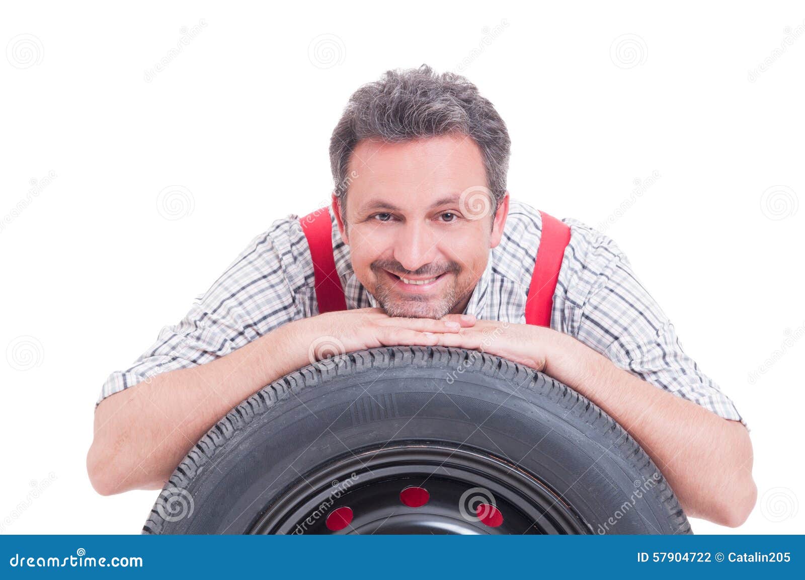 Friendly Mechanic Resting Head on Tire Stock Photo - Image of ...