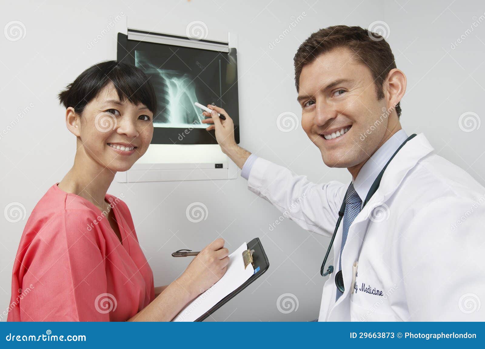 Friendly Medical Staff Members with X-Ray Results Stock Image - Image ...