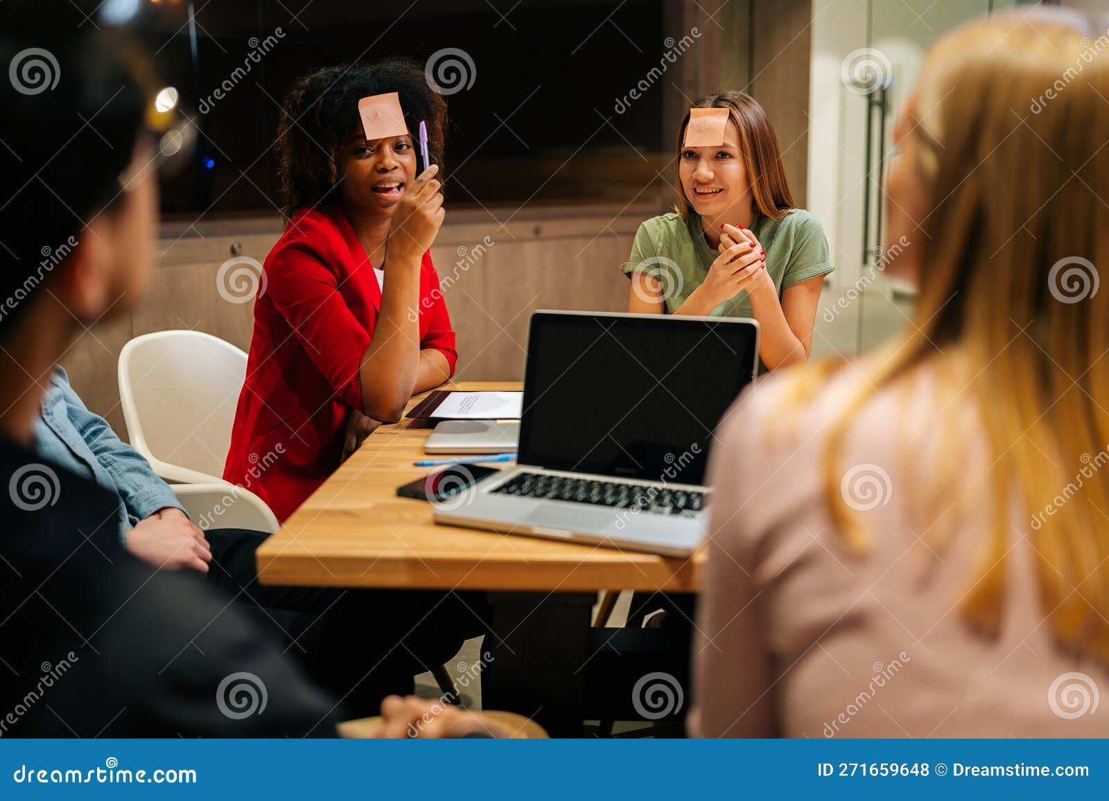 Friendly Multiethnic Startup Team Playing Guessing Game with Sticky ...