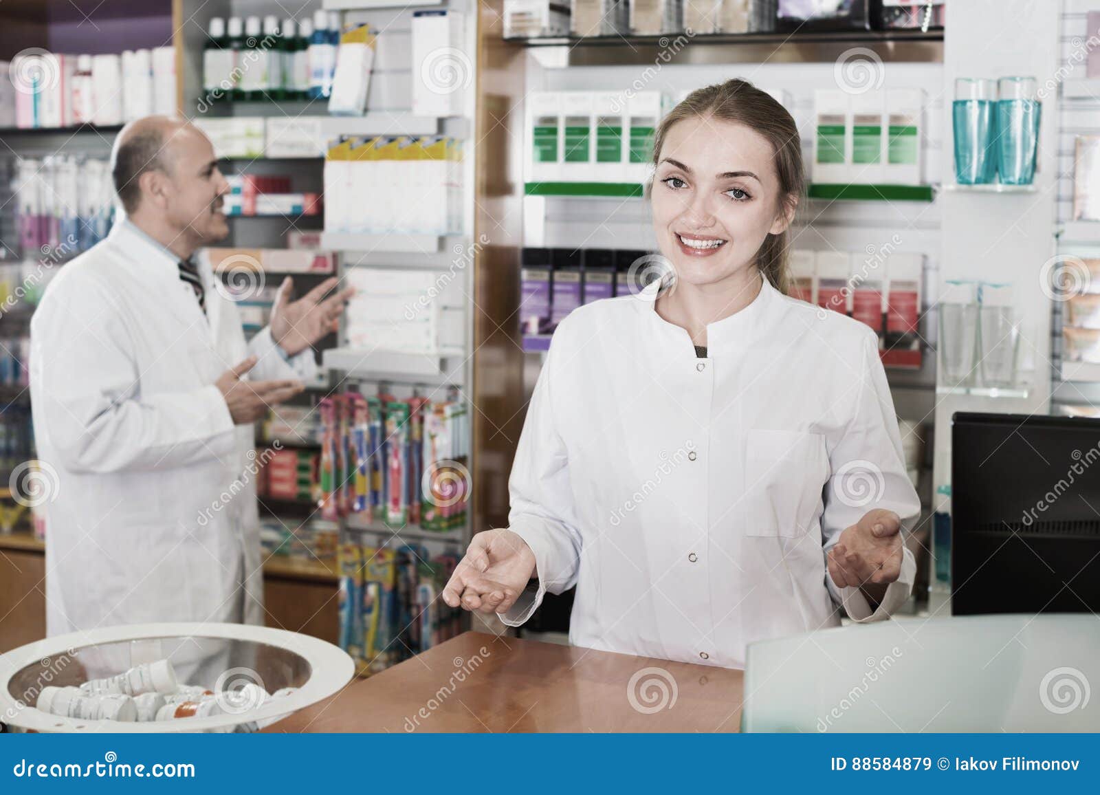 Friendly Pharmaceutists at Reception of Drugstore Stock Image - Image ...