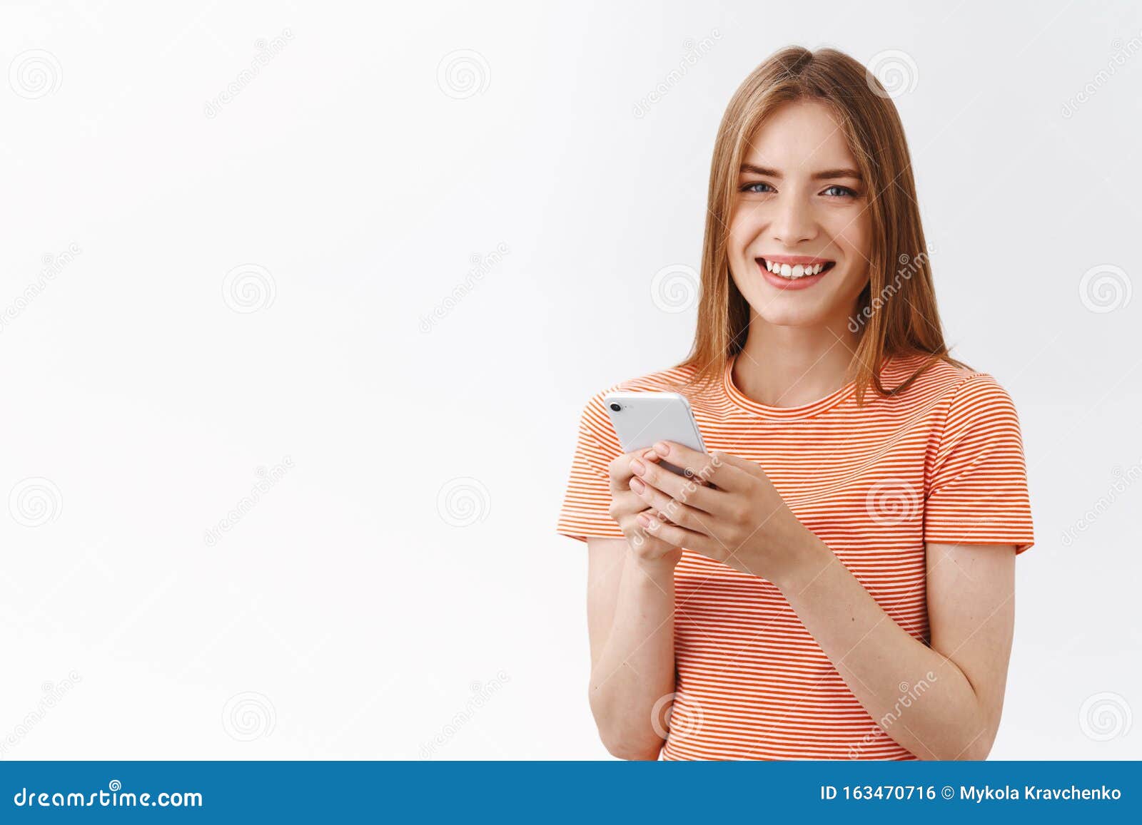 Friendly Pretty Young Carefree Woman In Striped T Shirt Hold