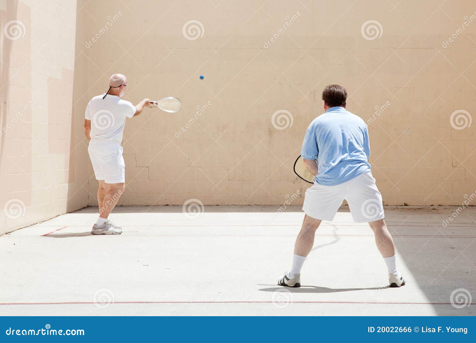 Friendly Racquetball Game stock photo. Image of competition - 20022666