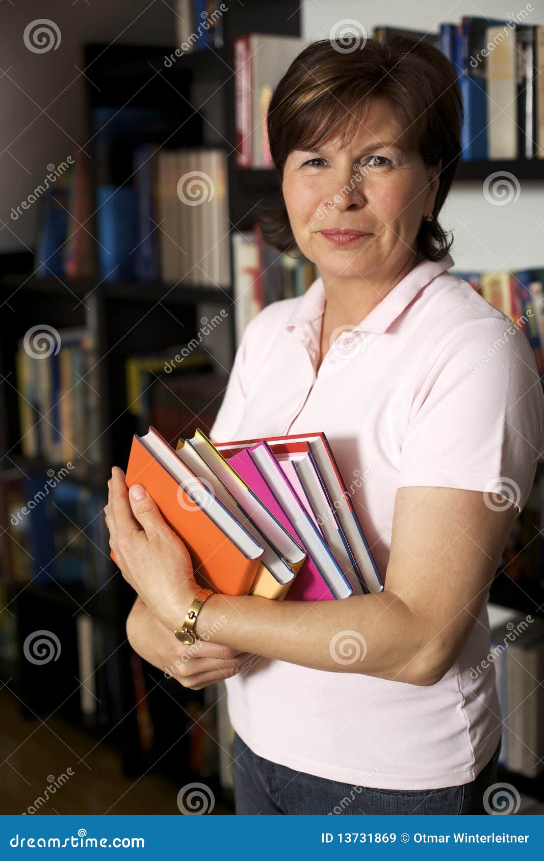Friendly Senior Woman Holding Books Stock Image - Image of beauty ...