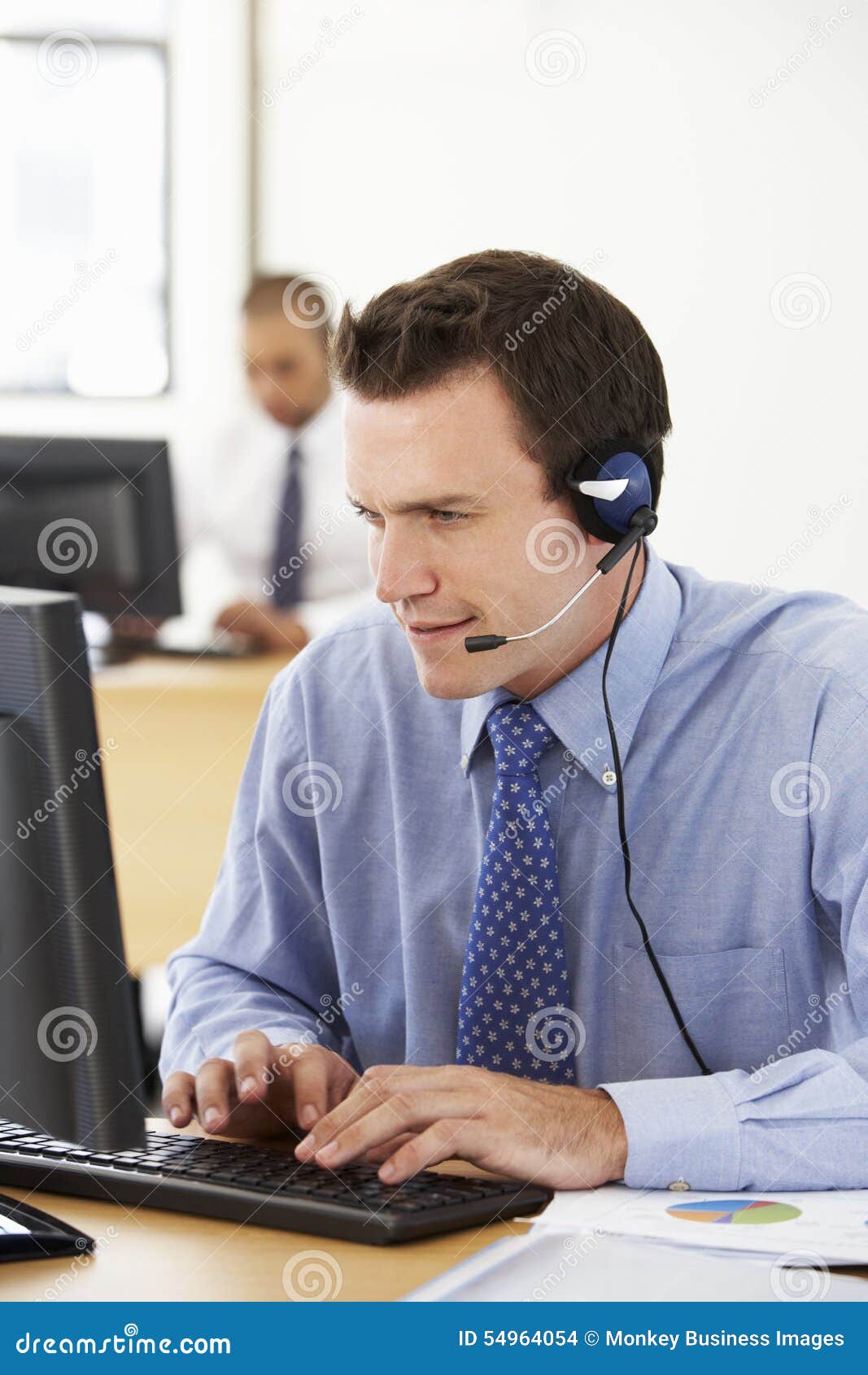 Friendly Service Agent Talking To Customer in Call Centre Stock Photo ...
