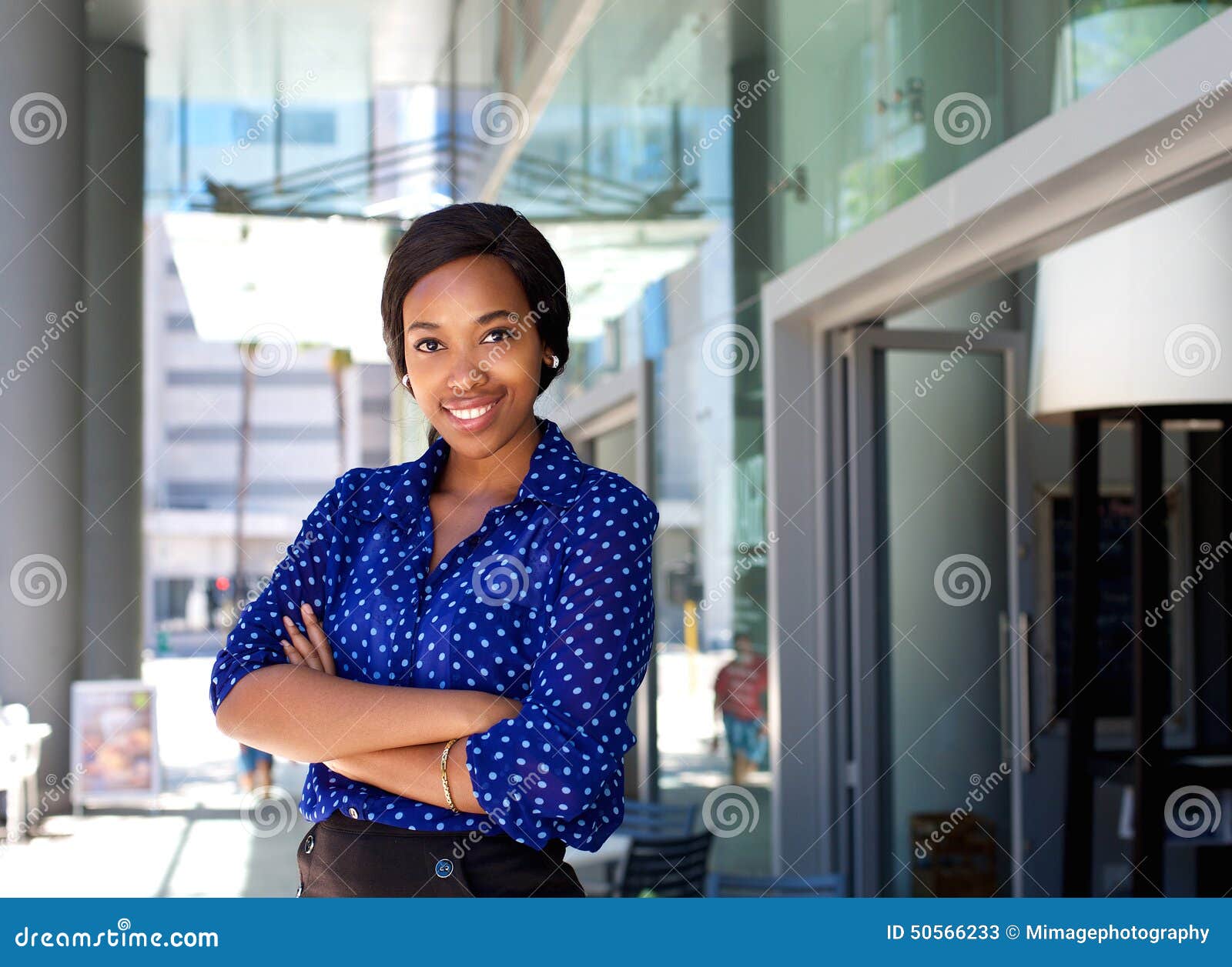 Friendly Smiling Business Woman Standing Outside in the City Stock ... Friendly Smiling Business Woman Standing Outside in the City Stock ...