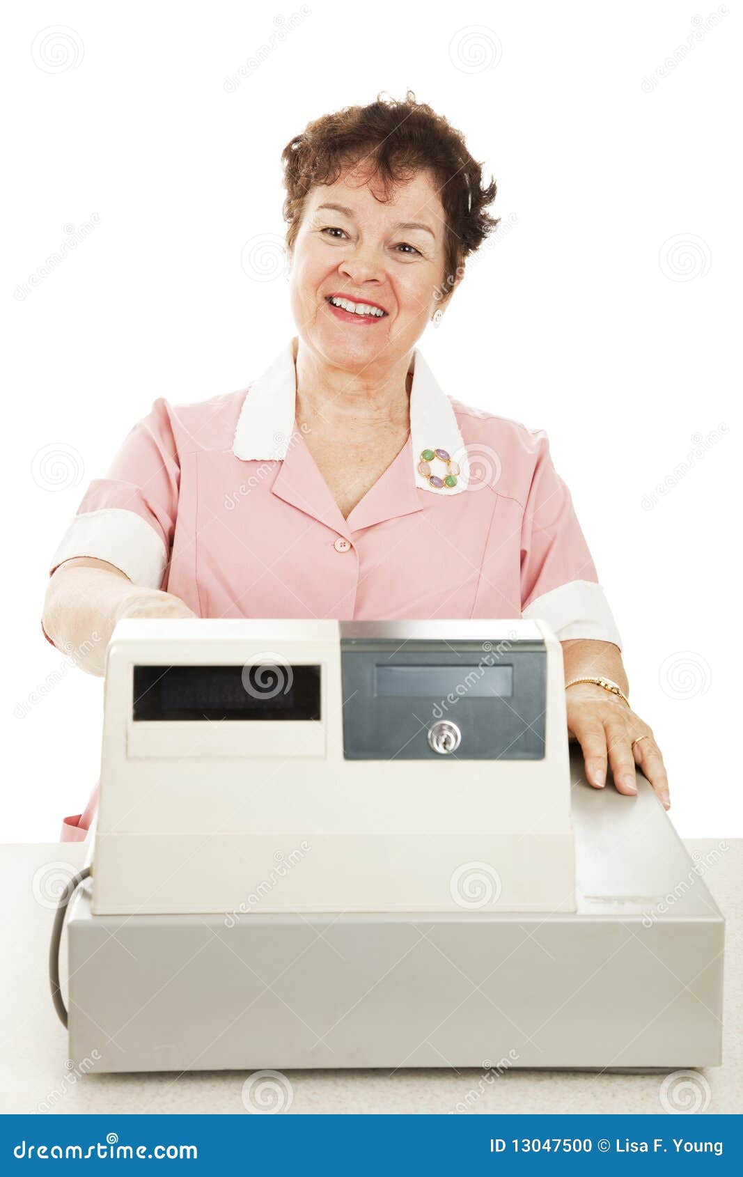 Friendly Smiling Cashier stock photo. Image of mature - 13047500