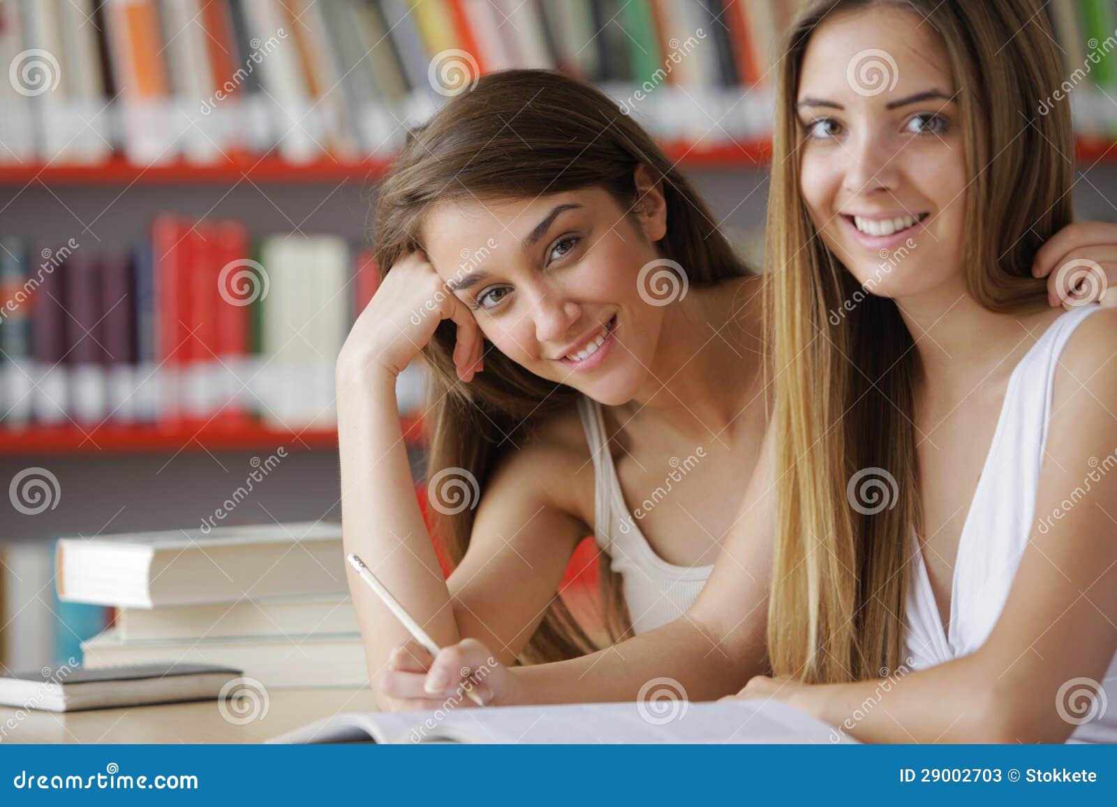 Friendly students stock image. Image of library, textbook - 29002703