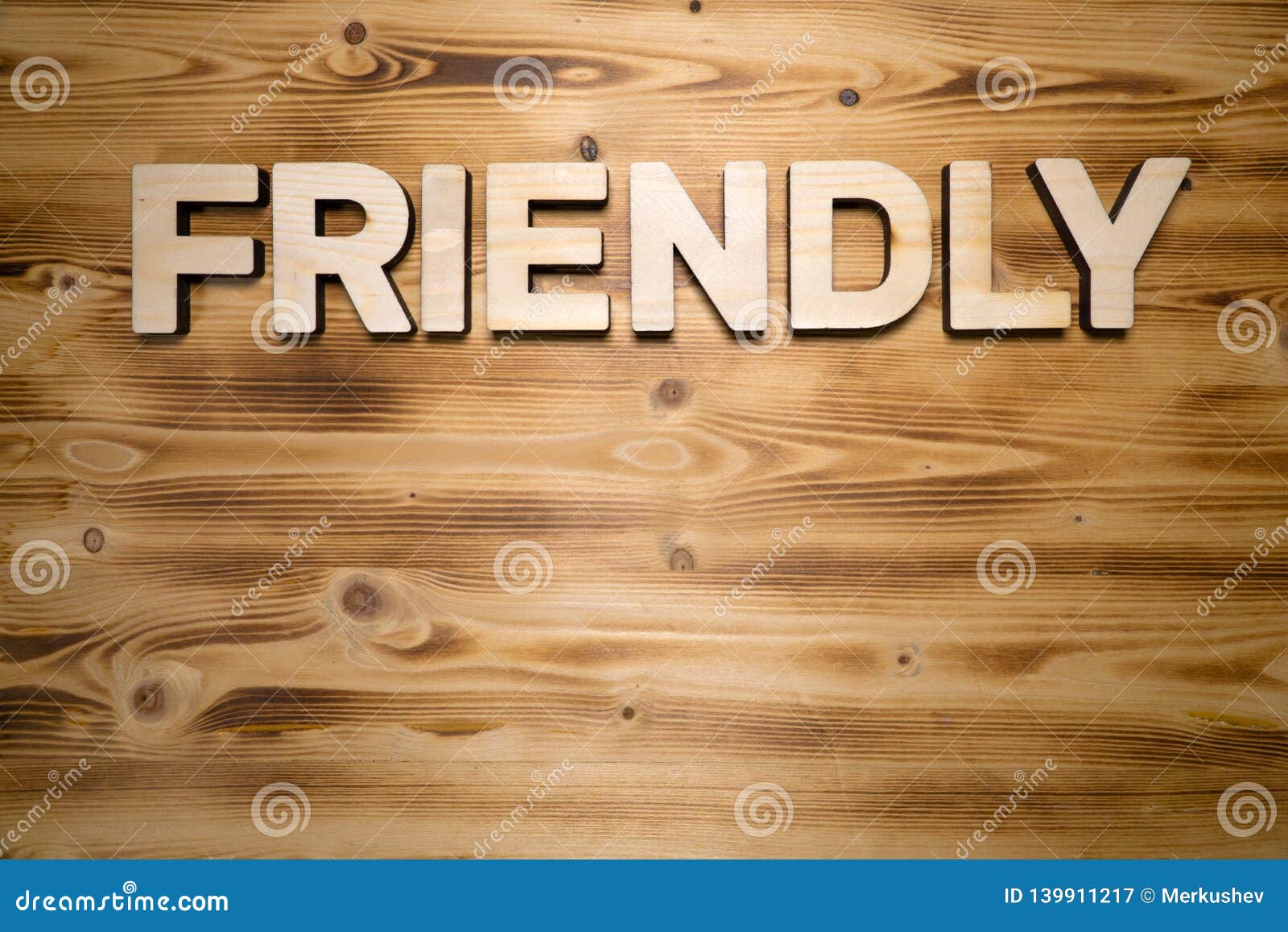 FRIENDLY Word Made with Building Blocks on Wooden Board Stock Image ...