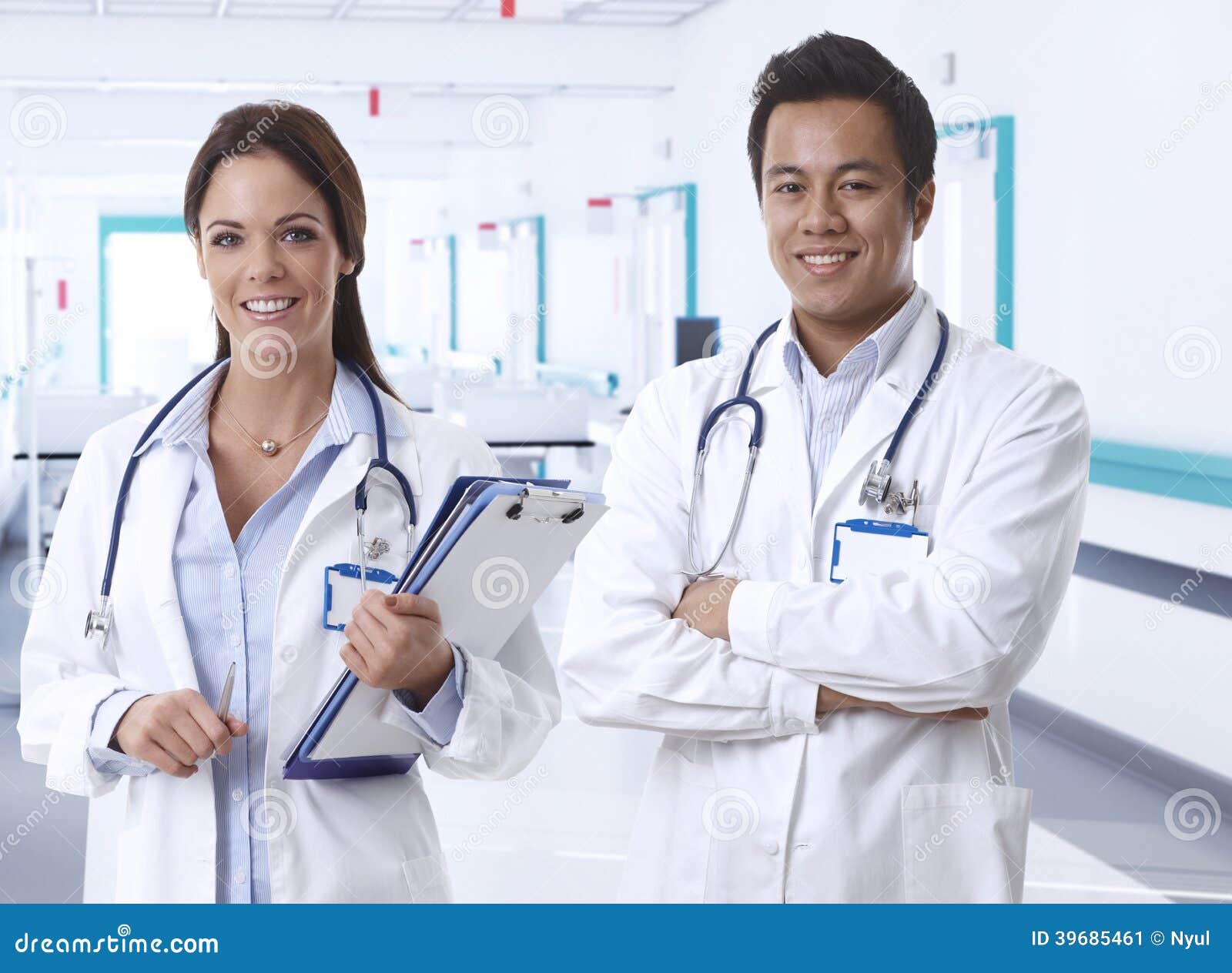 Friendly Young Doctors on Hospital Corridor Smile Stock Image - Image ...