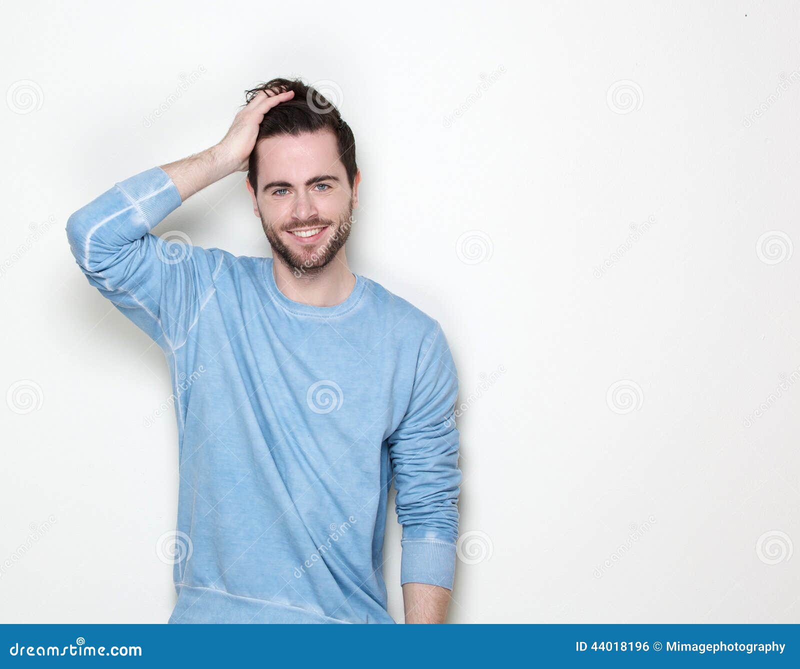 Friendly young man smiling stock photo. Image of cute - 44018196