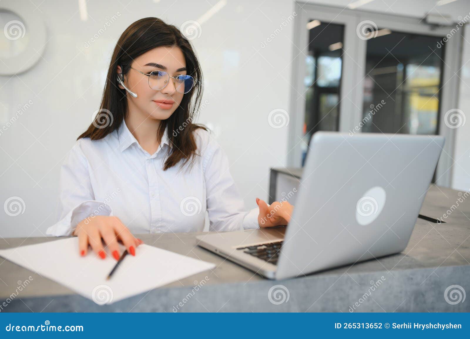 Friendly Young Woman Behind the Reception Desk Administrator Stock ...