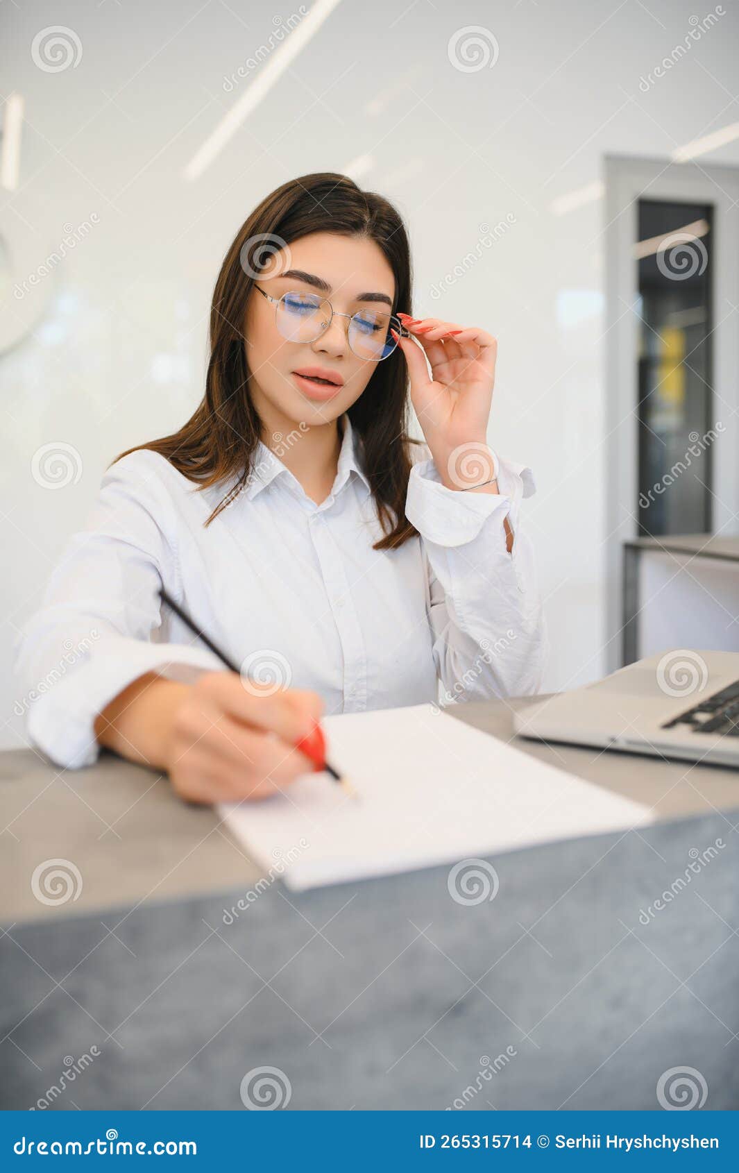 Friendly Young Woman Behind the Reception Desk Administrator Stock ...