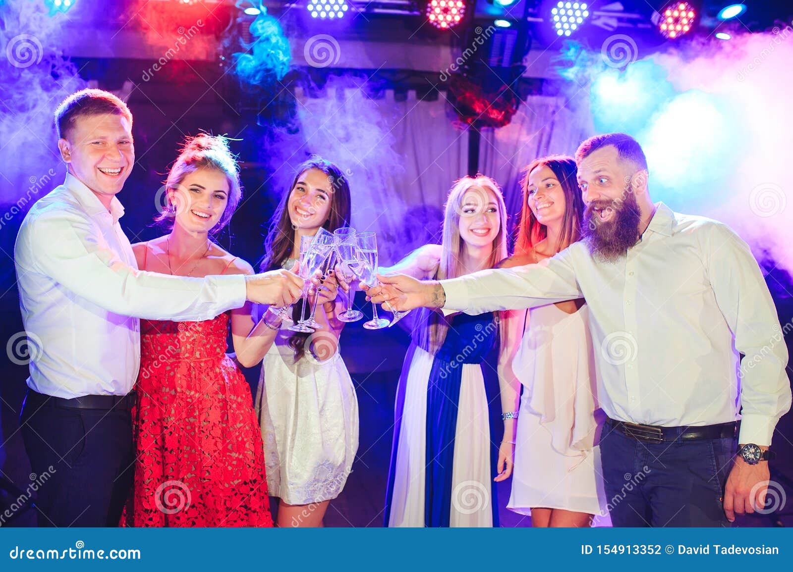 Friends with Alcoholic Drinks at a Party. Stock Photo - Image of drinks ...