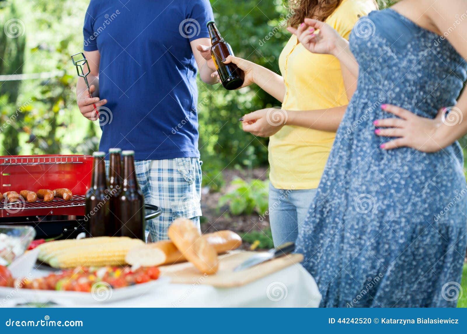 Friends during barbecue stock photo. Image of grilling - 44242520