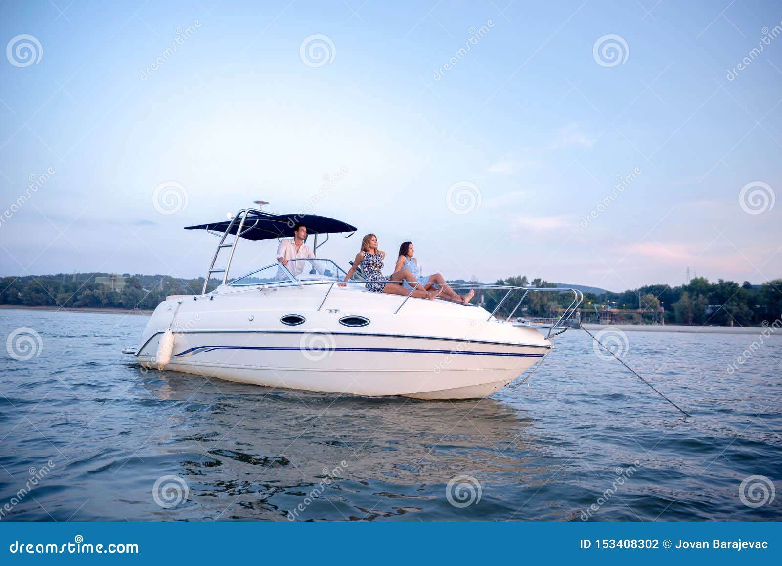 Friends on a boat enjoying stock photo. Image of celebration - 153408302