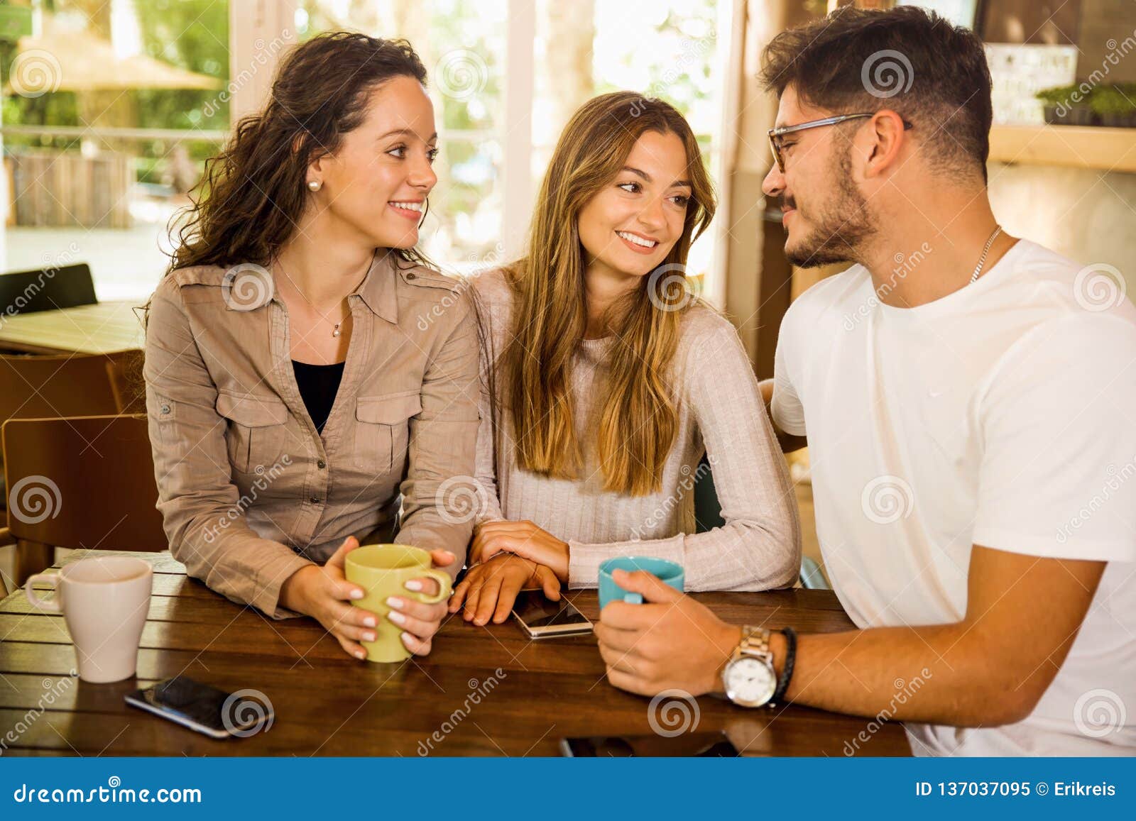 Friends at the cafe stock image. Image of portrait, shop - 137037095
