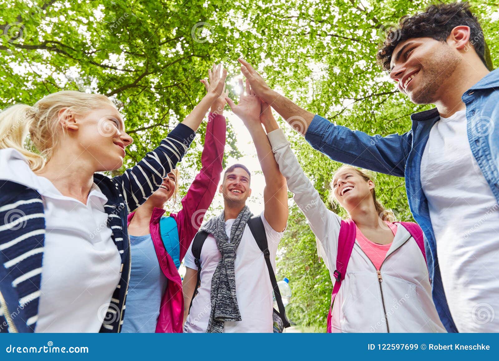 Friends Celebrate Success with High Five Stock Image - Image of ...