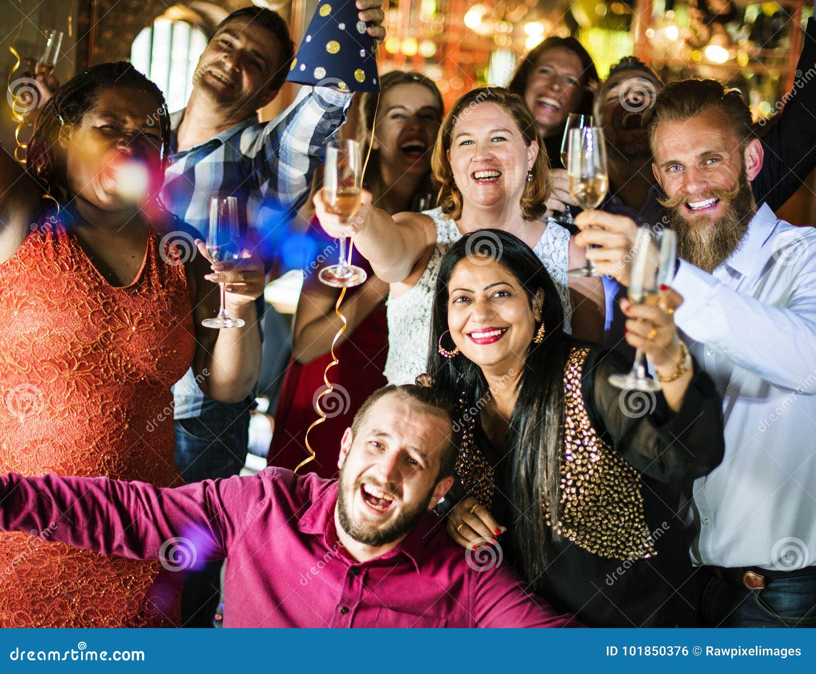 Friends Celebrating New Years Eve Stock Photo - Image of celebration ... Friends Celebrating New Years Eve Stock Photo - Image of celebration ...
