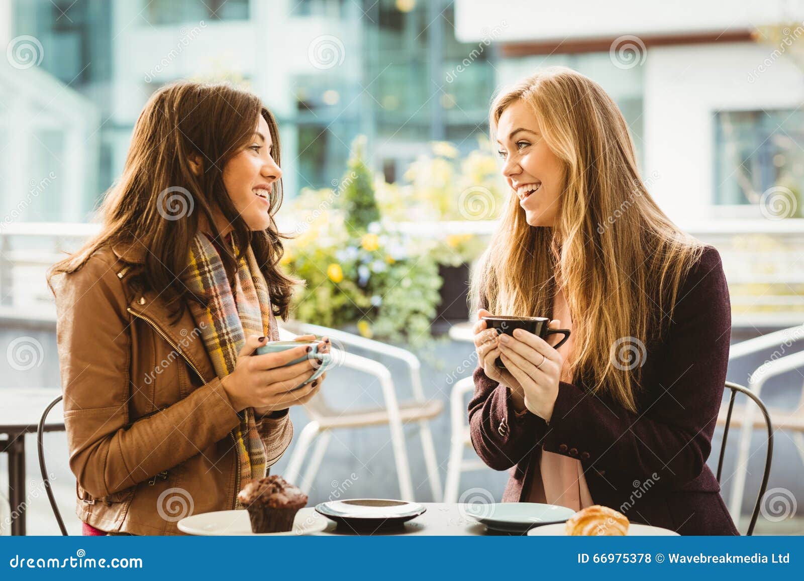 Friends Chatting Over Coffee Stock Photo - Image of cafeteria ...