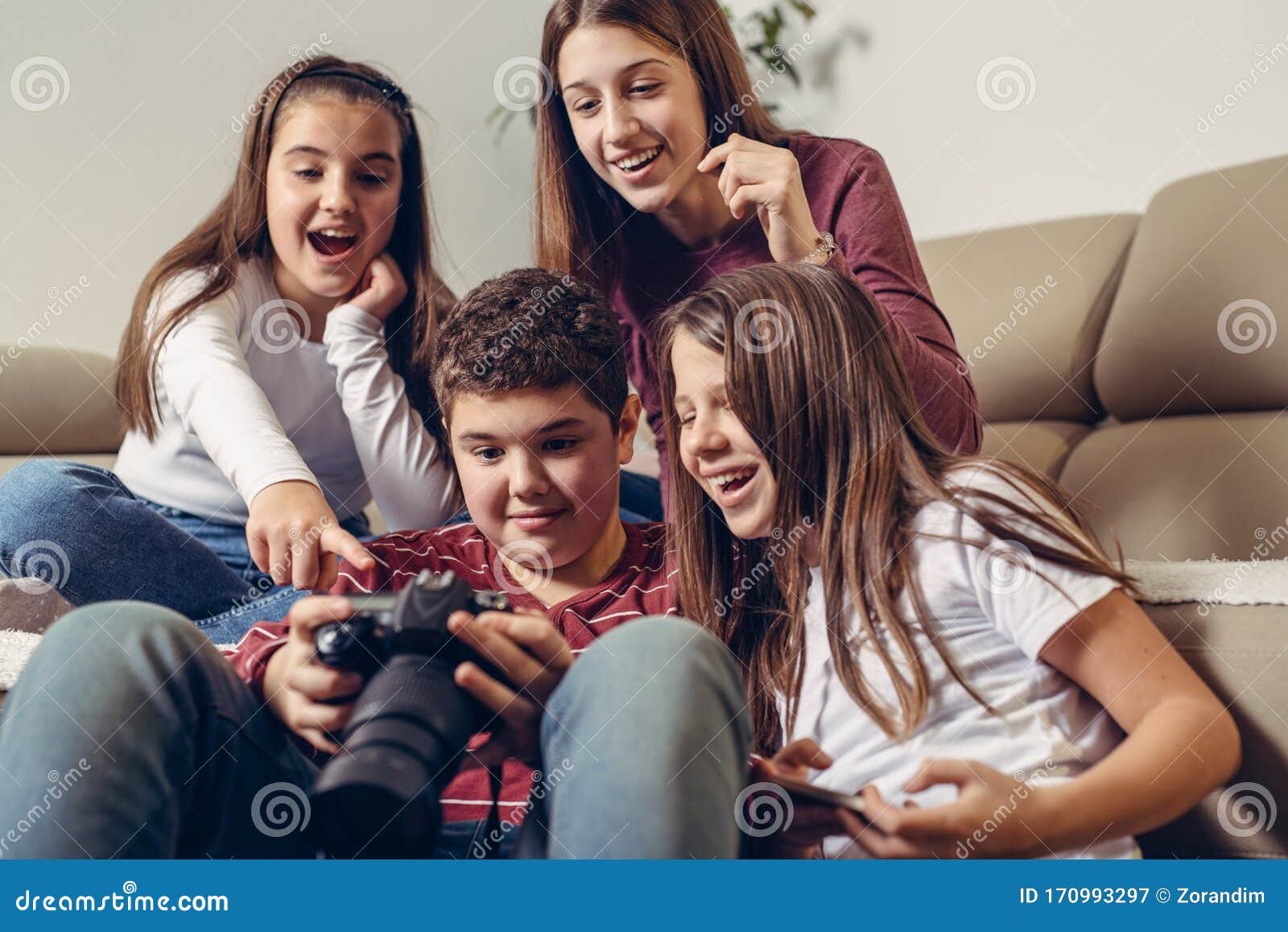 Friends Checking Photos on a Camera Stock Image - Image of recreation ...