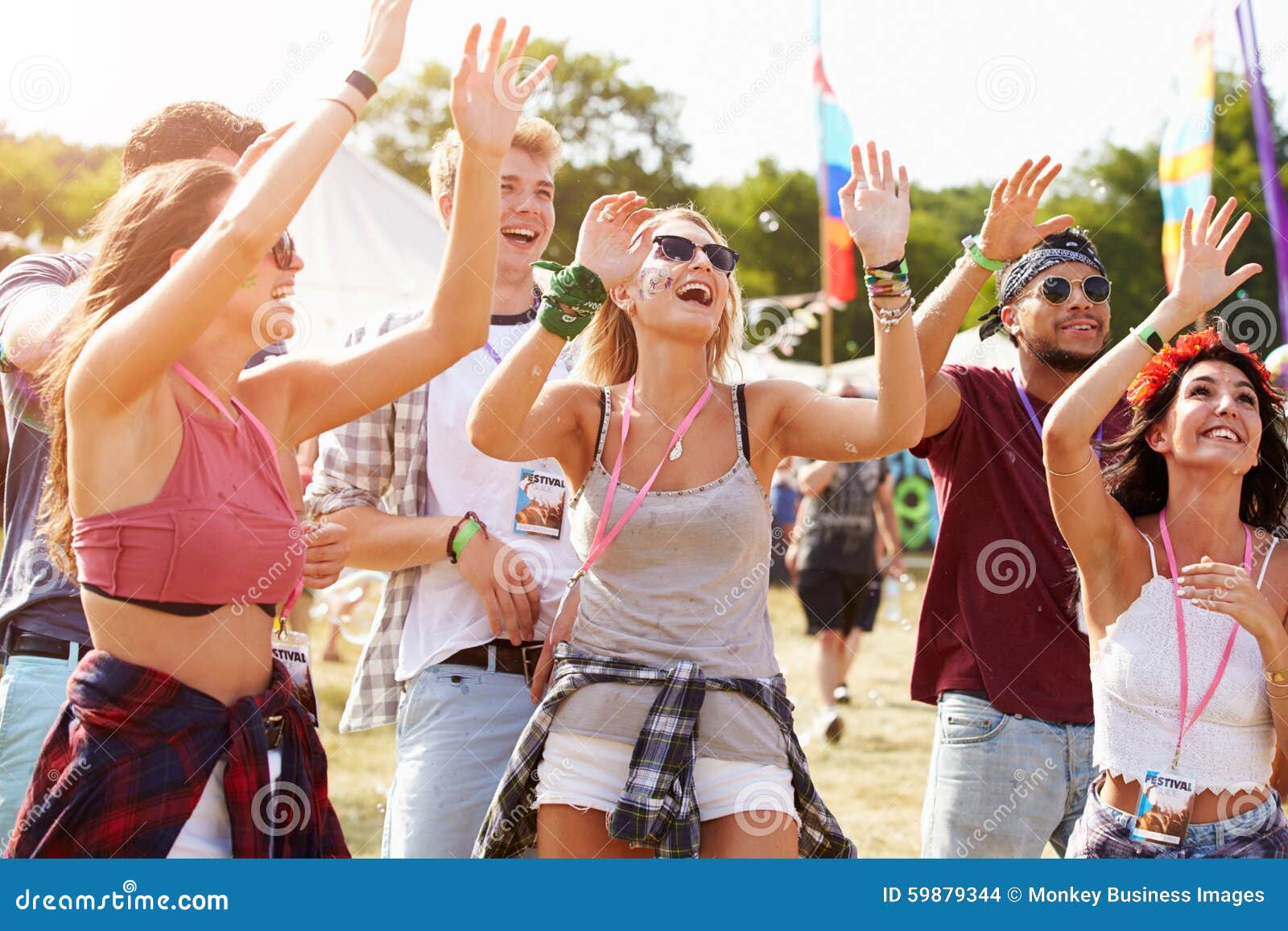 Friends Cheering a Performance at a Music Festival Stock Photo - Image ...