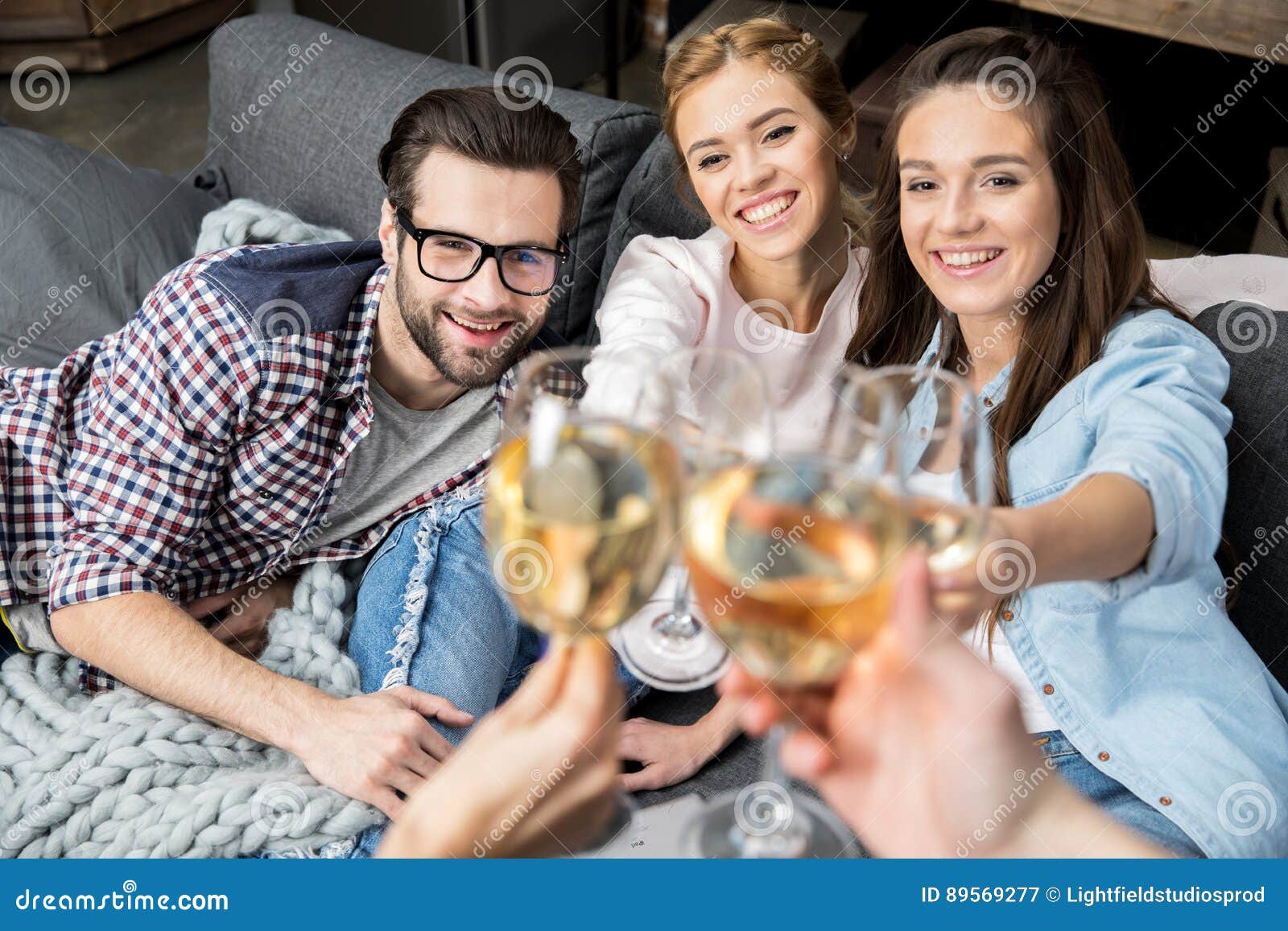 Friends cheering with wine stock image. Image of drink - 89569277