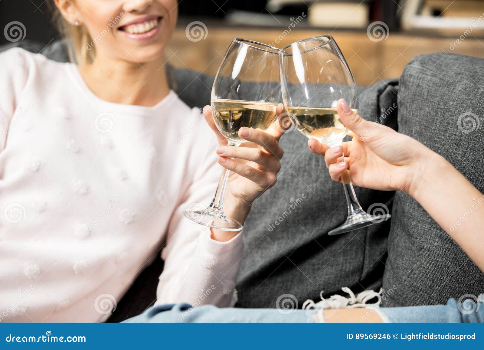 Friends cheering with wine stock photo. Image of toasting - 89569246