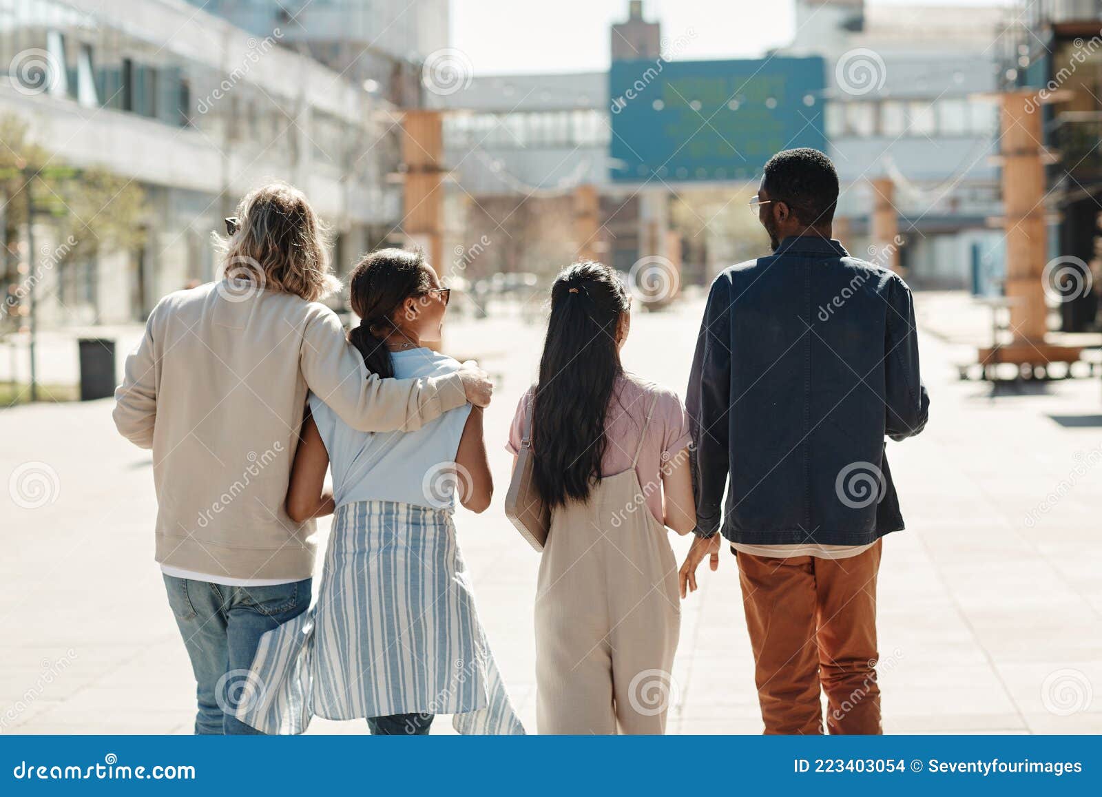 Friends in City Back View stock photo. Image of city - 223403054