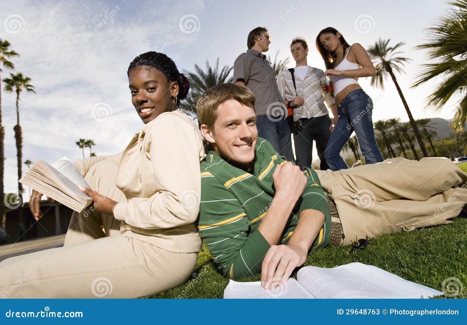 Friends in College Campus stock image. Image of lawn - 29648763