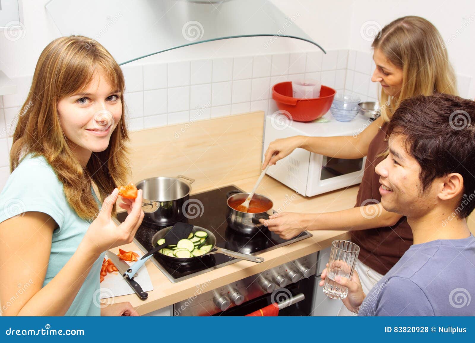 Friends Cooking Together stock photo. Image of adult - 83820928