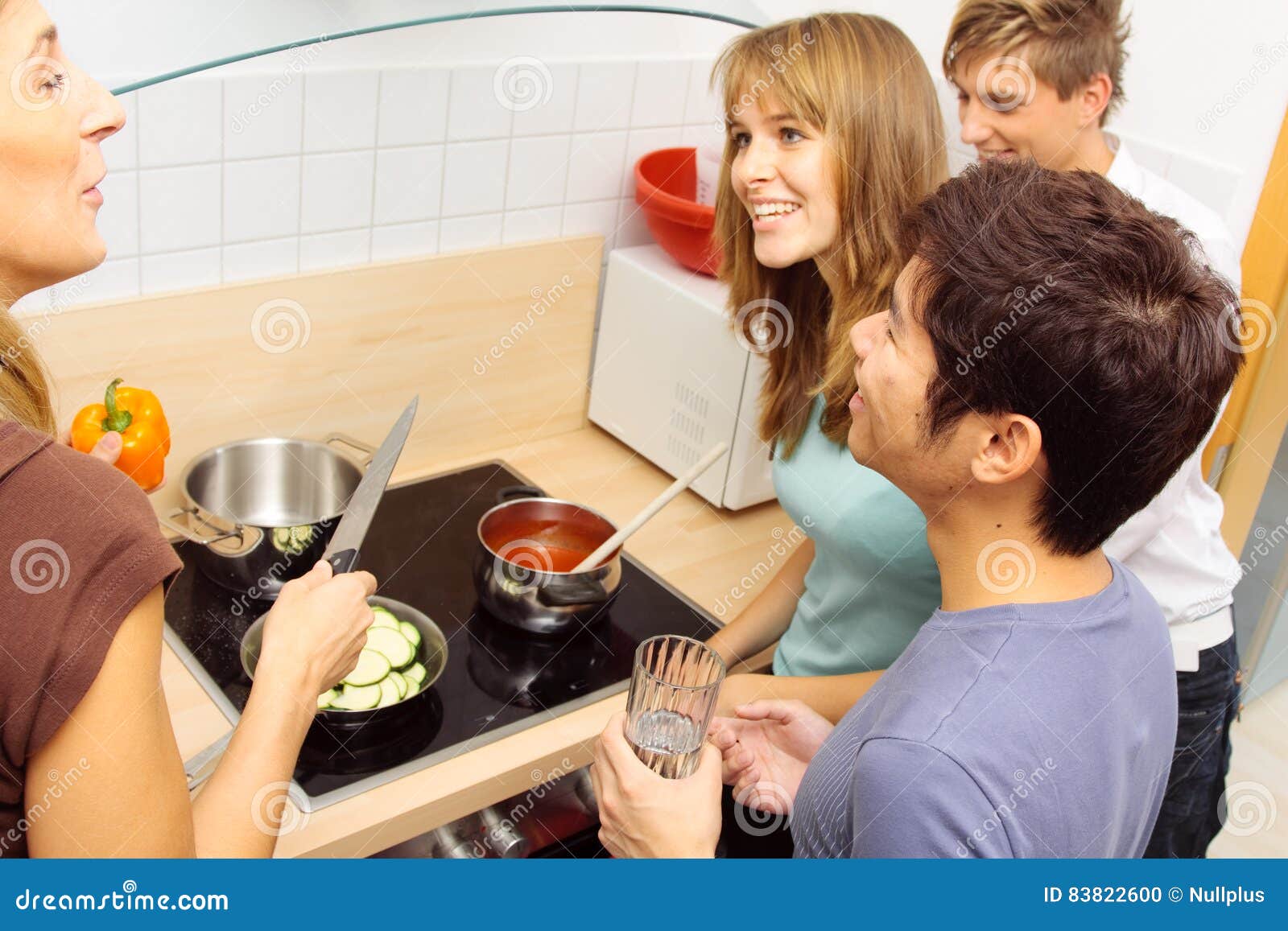 Friends Cooking Together stock photo. Image of people - 83822600