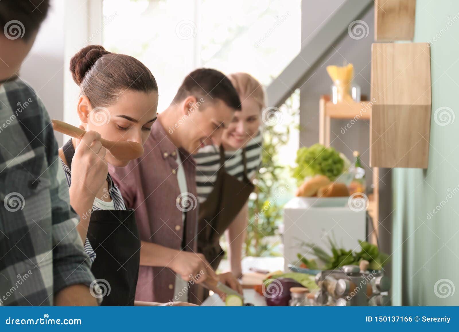 Friends Cooking Together in Kitchen Stock Photo - Image of cooking ...