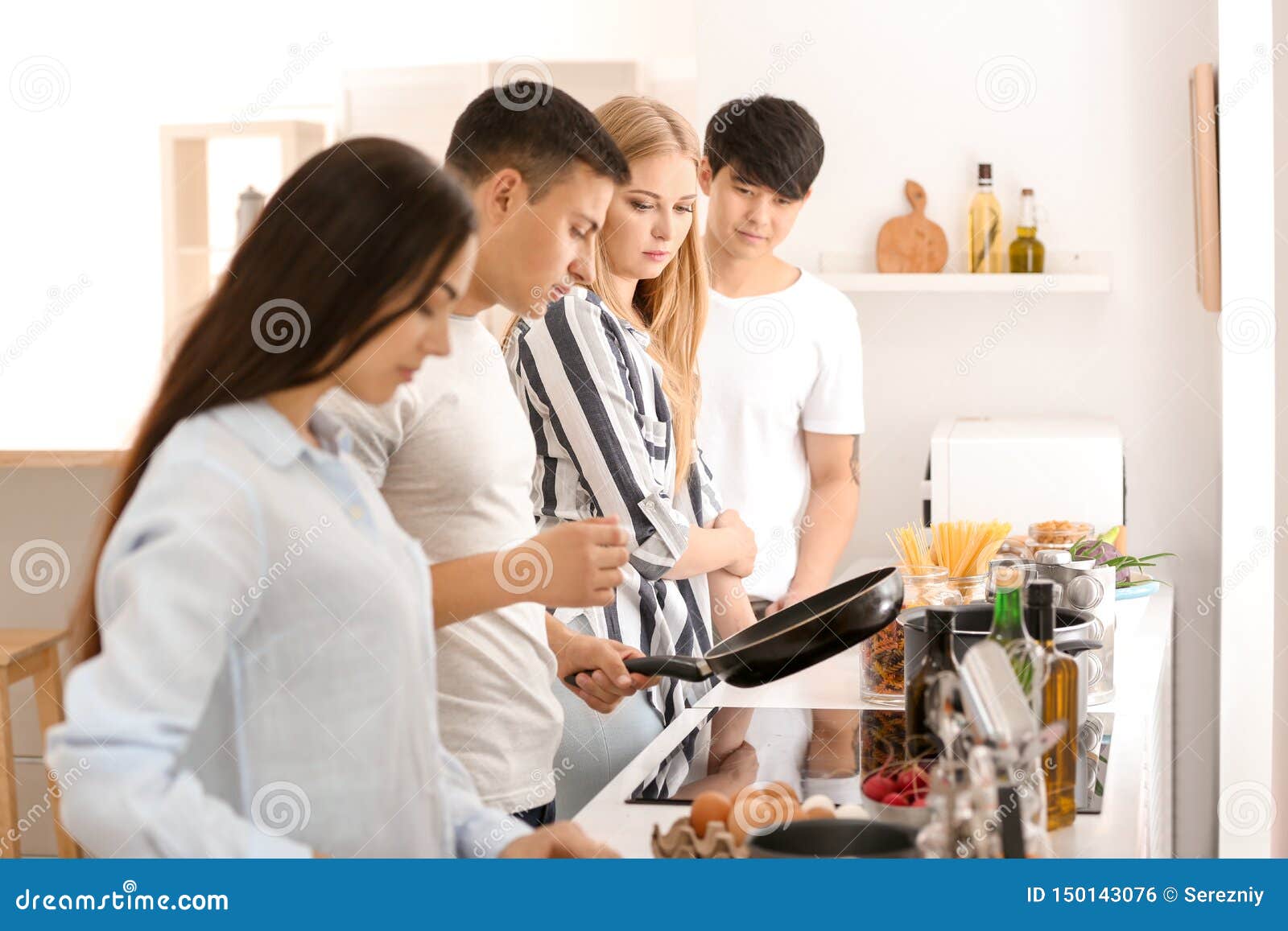 Friends Cooking Together in Kitchen Stock Photo - Image of people ...