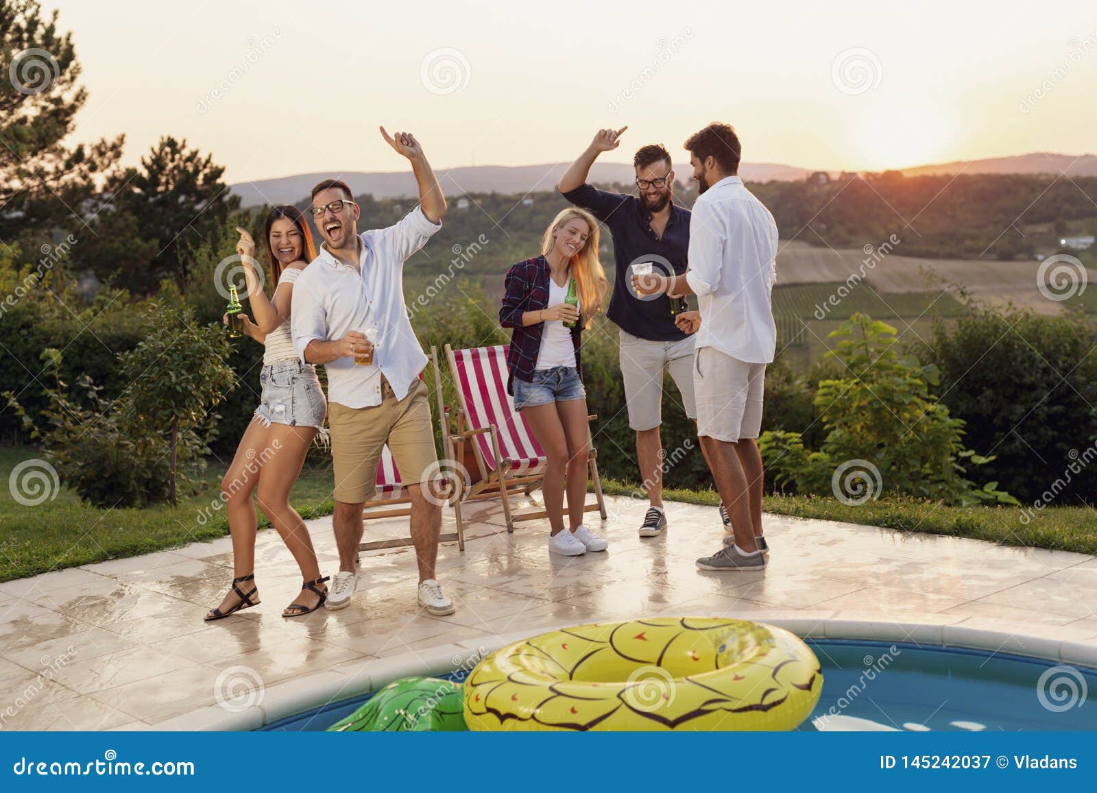 Friends Dancing at the Poolside Party Stock Image - Image of floating ...