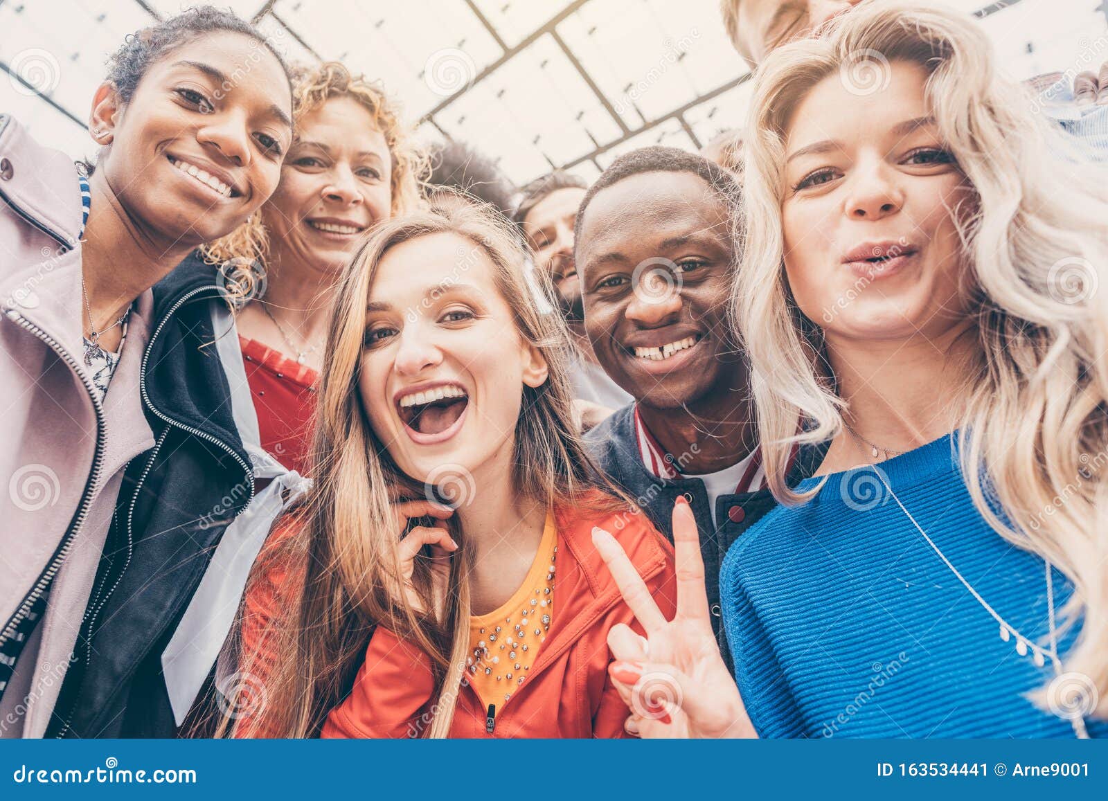 Friends of Different Ethnicities Looking into the Camera Stock Image ...