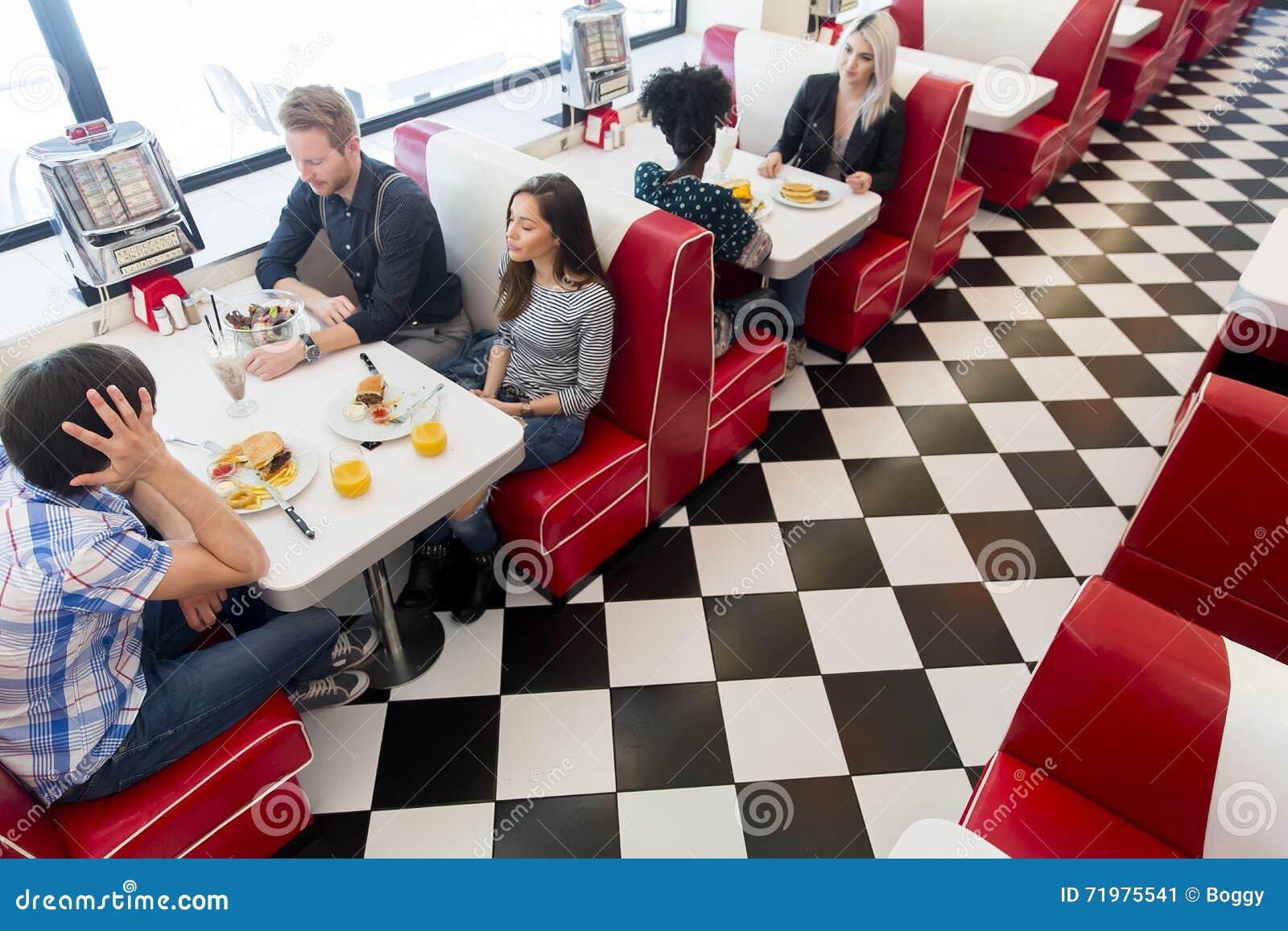 Friends in the diner stock image. Image of young, couple - 71975541
