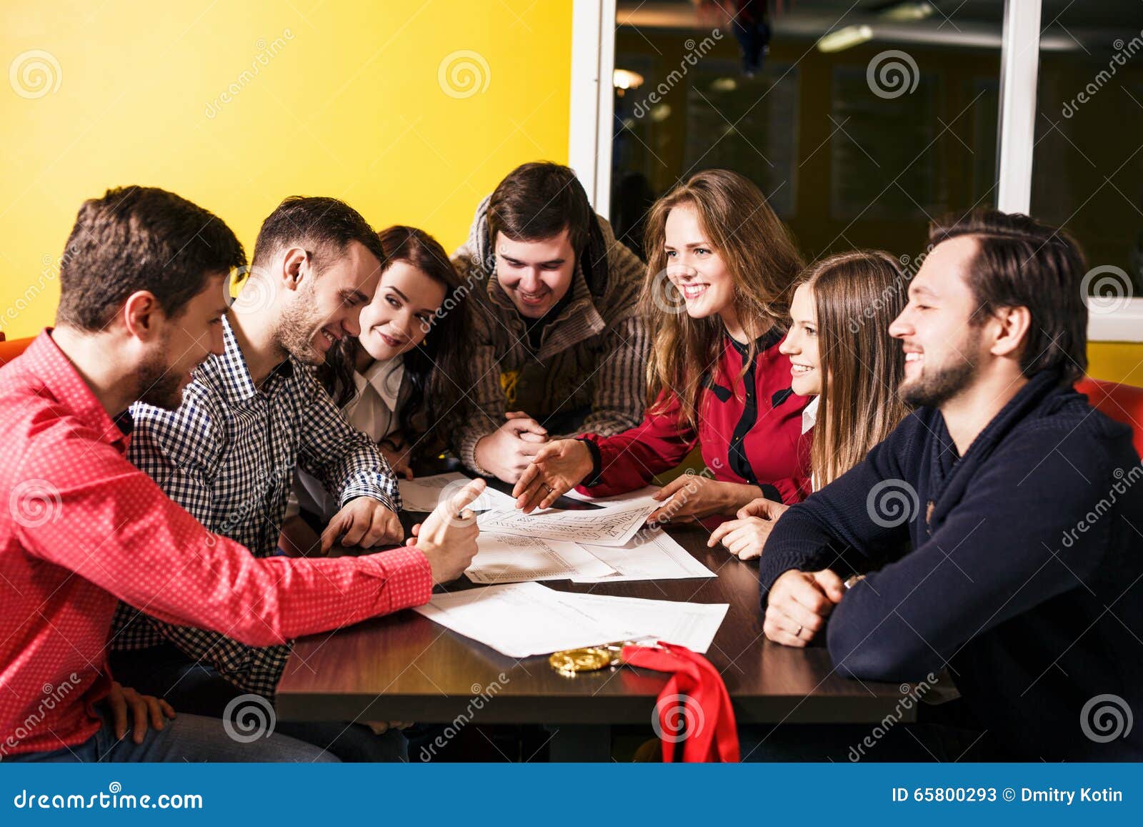 Friends Discussing Action Plan at the Table Stock Image - Image of ...