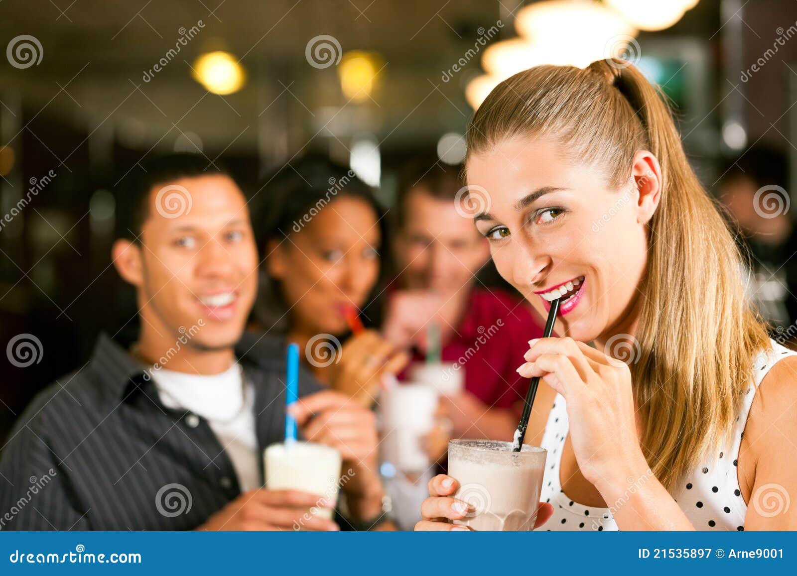 Friends Drinking Milkshakes in a Bar Stock Image - Image of diner ...