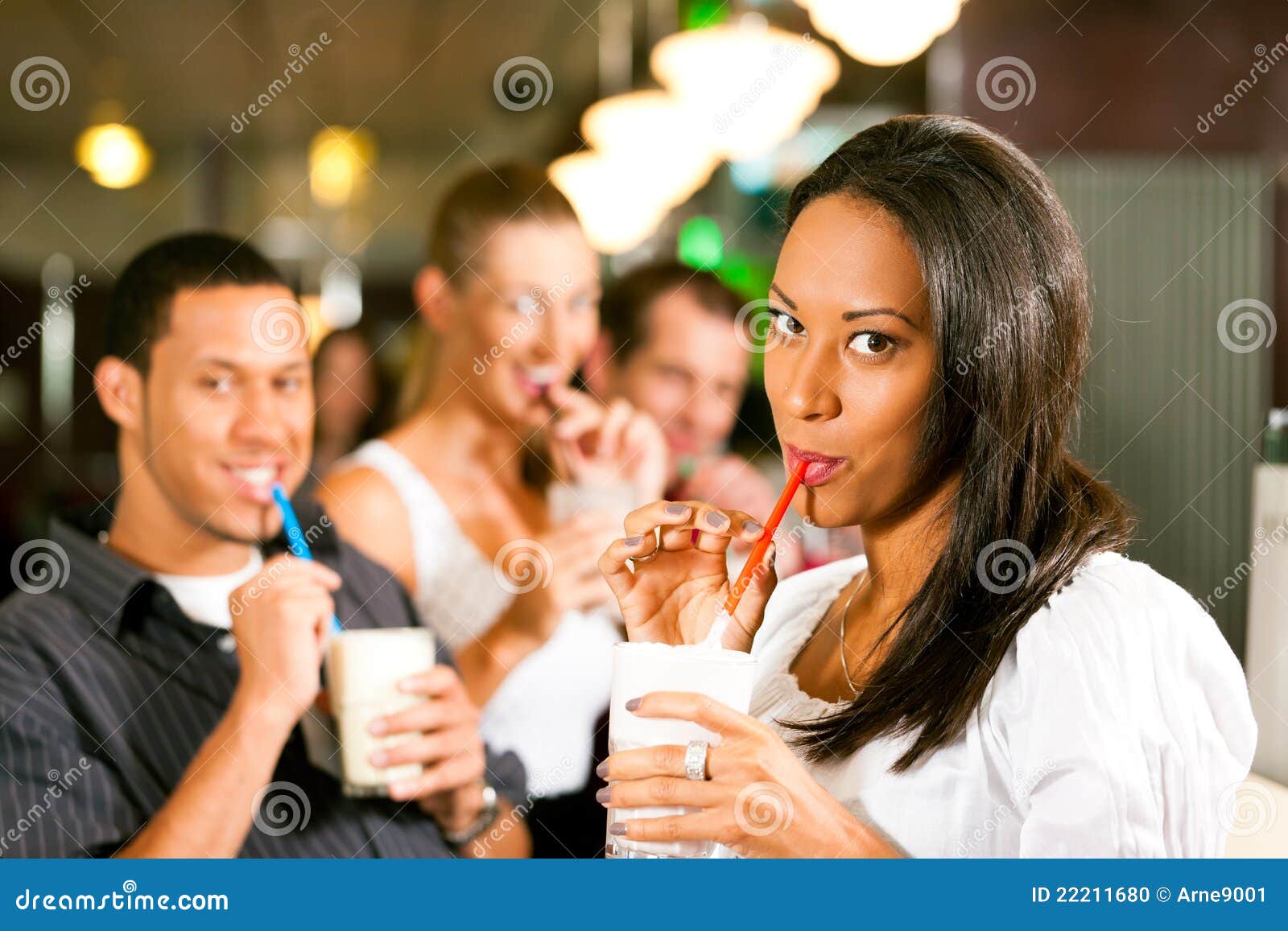 Friends Drinking Milkshakes in a Bar Stock Photo - Image of drinking ...