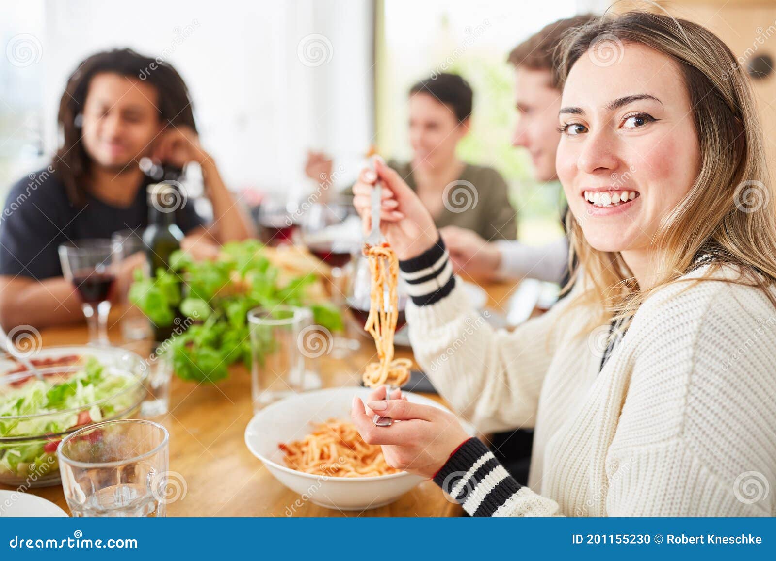 Friends Eat Spaghetti with Tomato Sauce in Shared Flat Stock Photo ...
