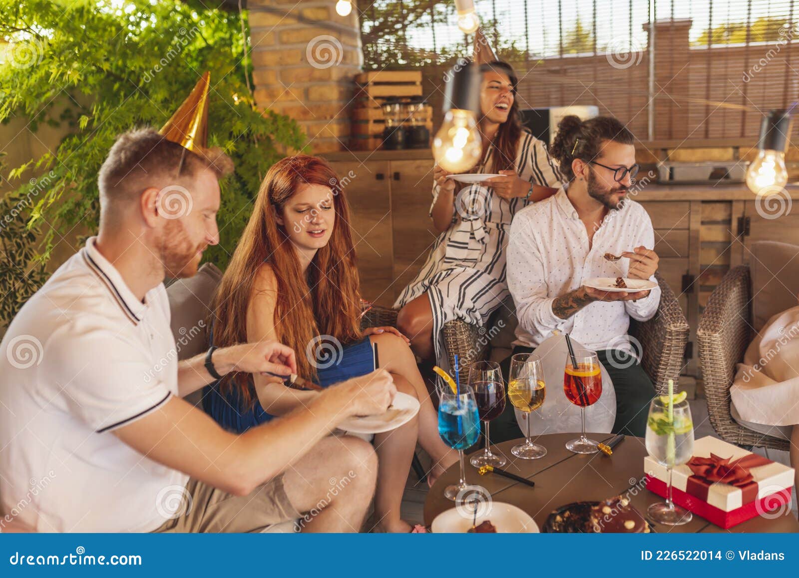 Friends Eating Cake at Birthday Party Stock Photo - Image of leisure ...