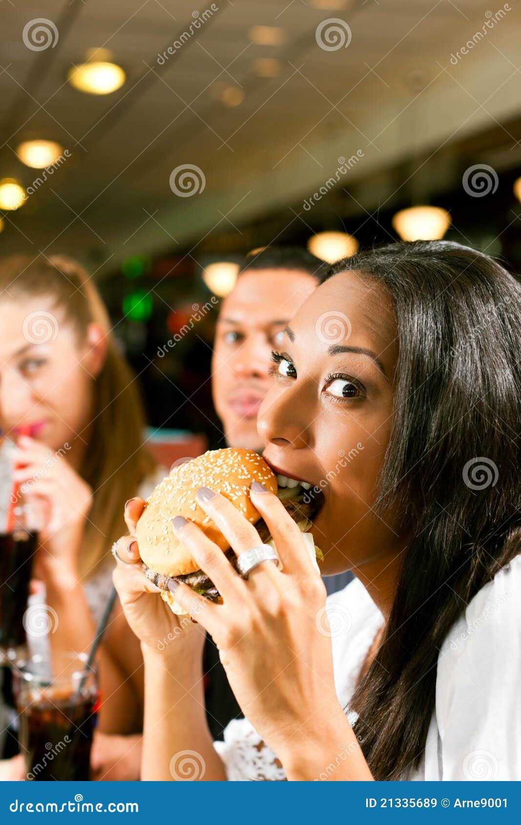 Friends Eating Fast Food in a Restaurant Stock Image - Image of ...