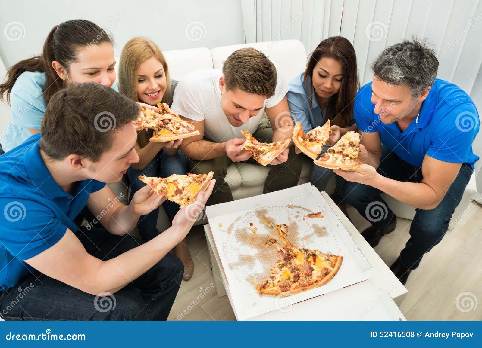 Friends eating pizza stock photo. Image of enjoyment - 52416508