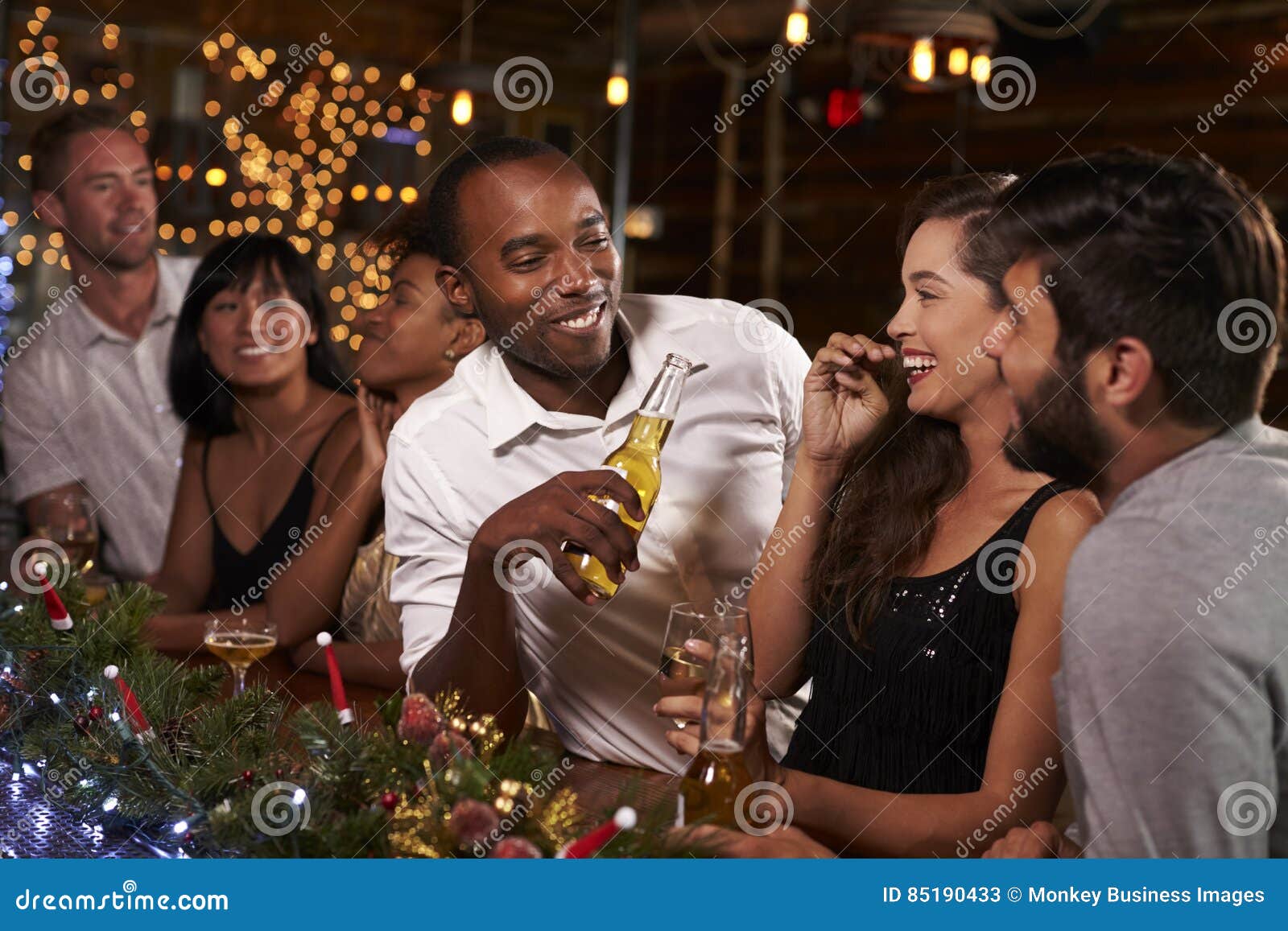 Friends Enjoying a Christmas Party Talk at the Bar Stock Image - Image ...