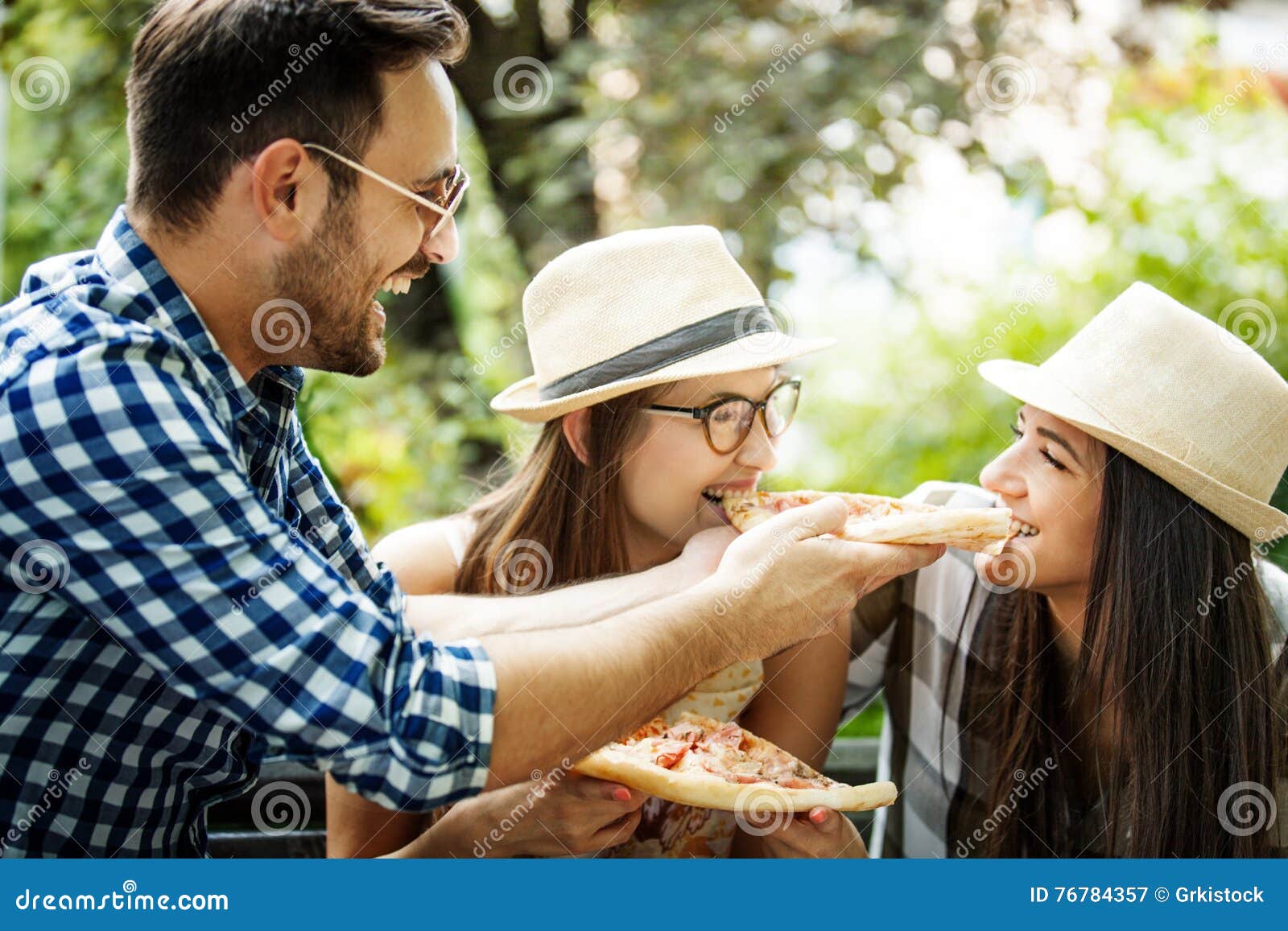 Friends Enjoying Outside stock image. Image of casual - 76784357