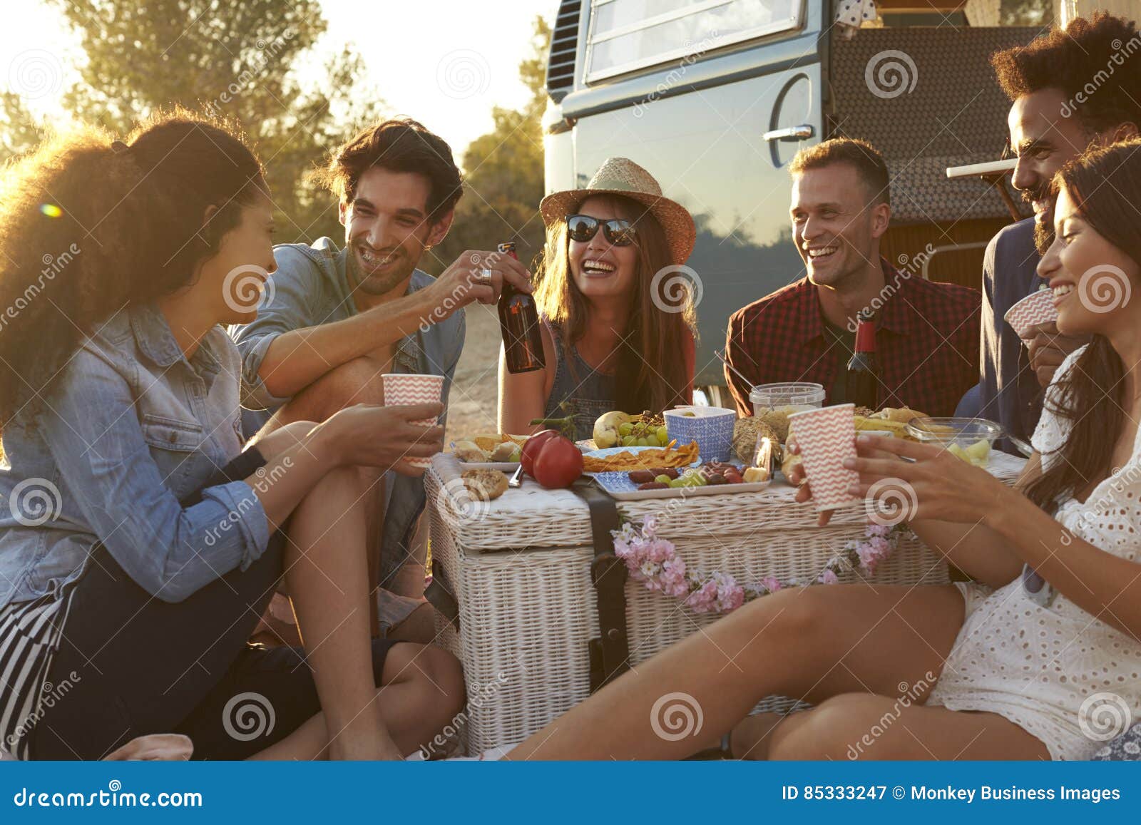 Friends Enjoying a Picnic beside Their Camper Van Stock Image - Image ...