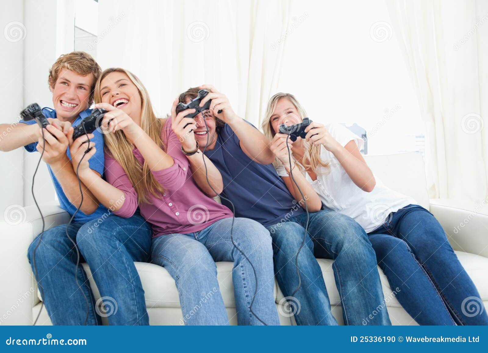 Friends Enjoying Video Games Stock Photo - Image of family, looking ...